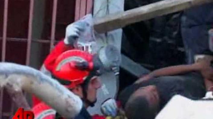 Rescuers Pull Haitian Man From Deep Under Rubble | VladTV