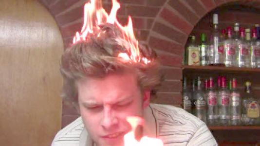 GUTSY: Man Sets Hair on Fire While Eating Flaming Doritos | VladTV