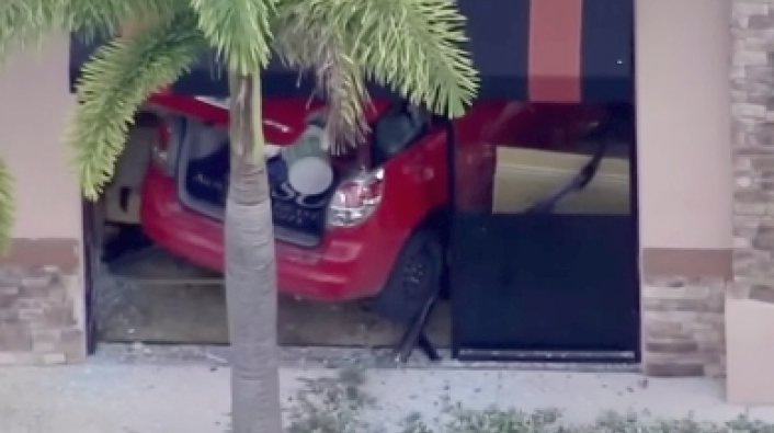 Car Gets Rear Ended and Sent Crashing Into Restaurant, 1 Dead and 2 Injured